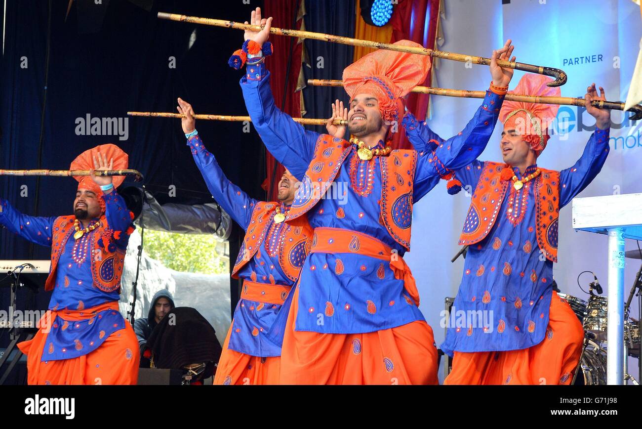 Members of the Asli Baharan Punjab Diyan dance group perform at the ...