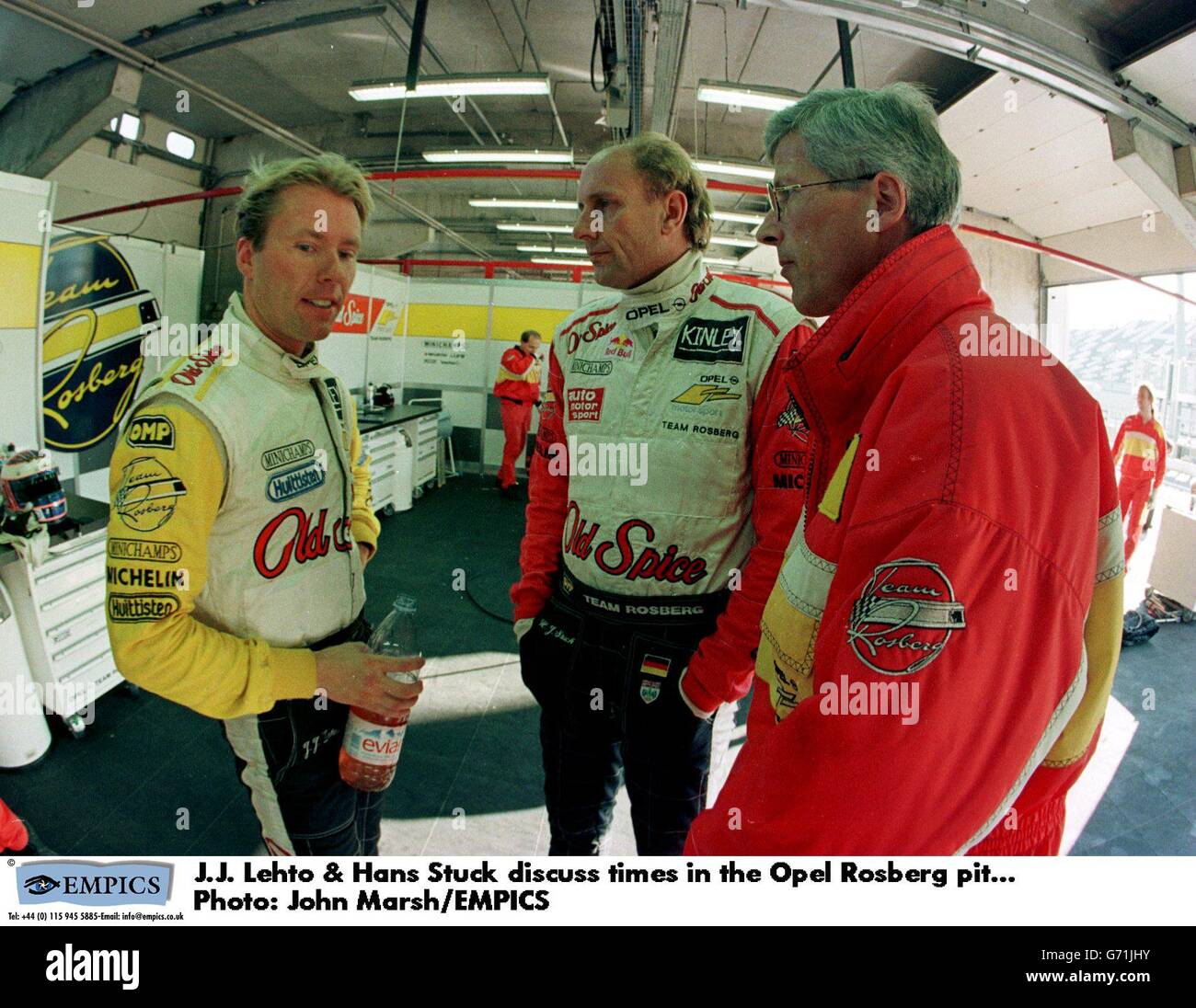 J.J. Lehto & Hans Stuck discuss times in the Opel Rosberg pit Stock ...