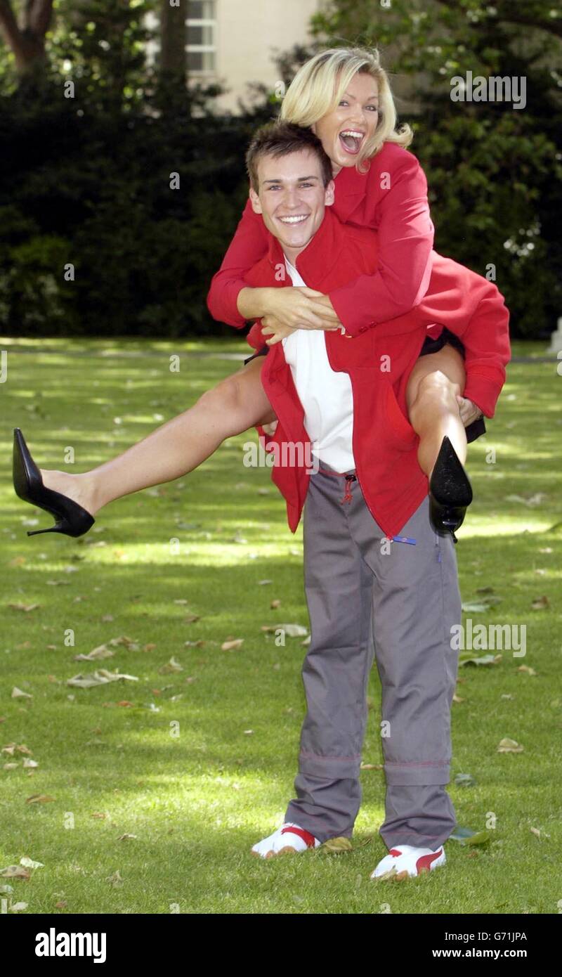 Smiling celebrity piggy back mini skirt leisure tourism nell mcandrew ...
