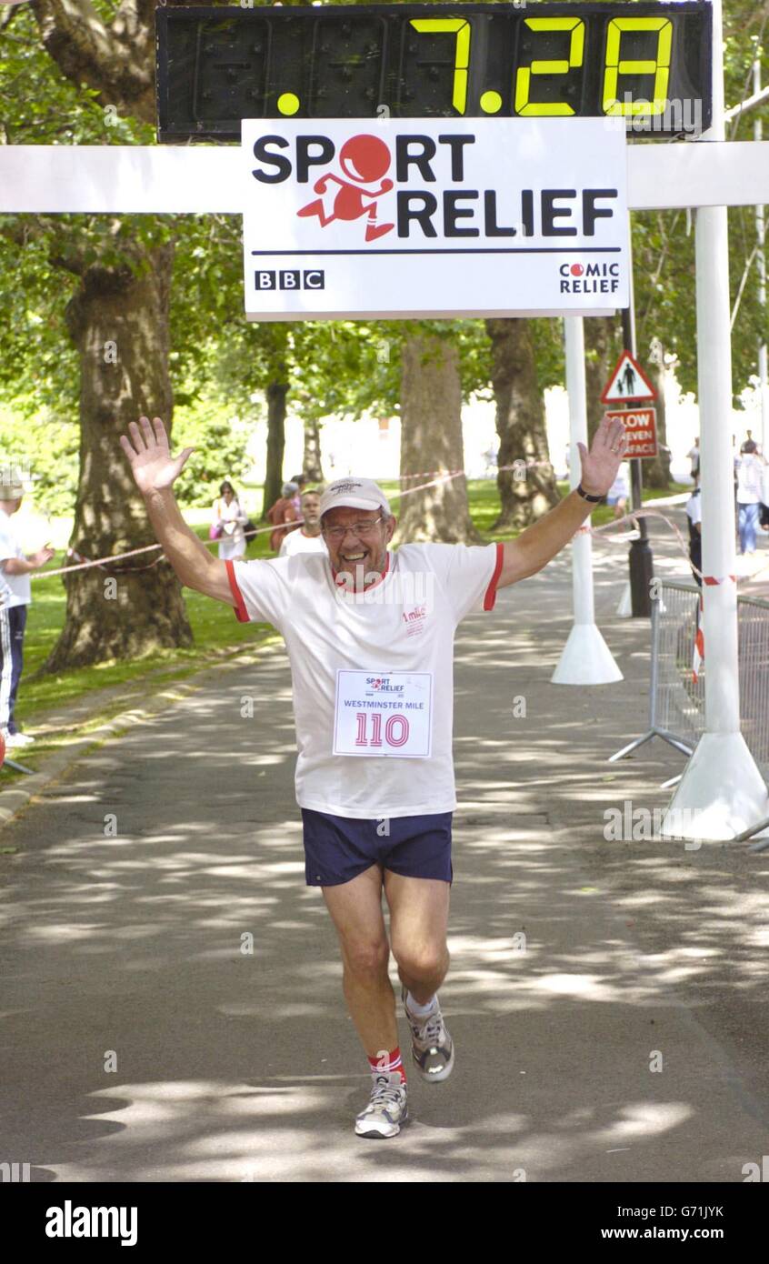 Sports Minister Richard Caborn crosses the finish line in the ...