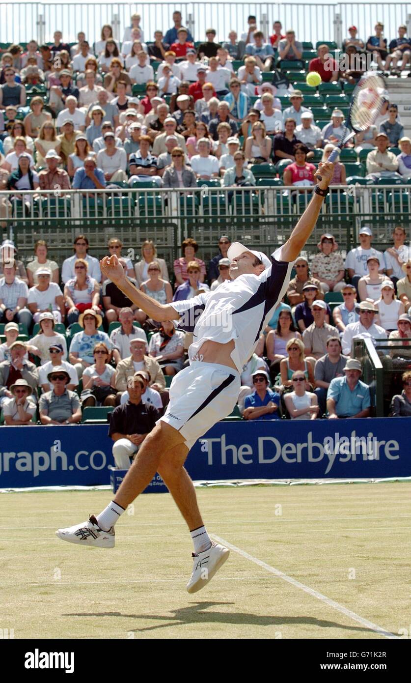 Great britains greg rusedski stretches overhead ball on way victory hi ...