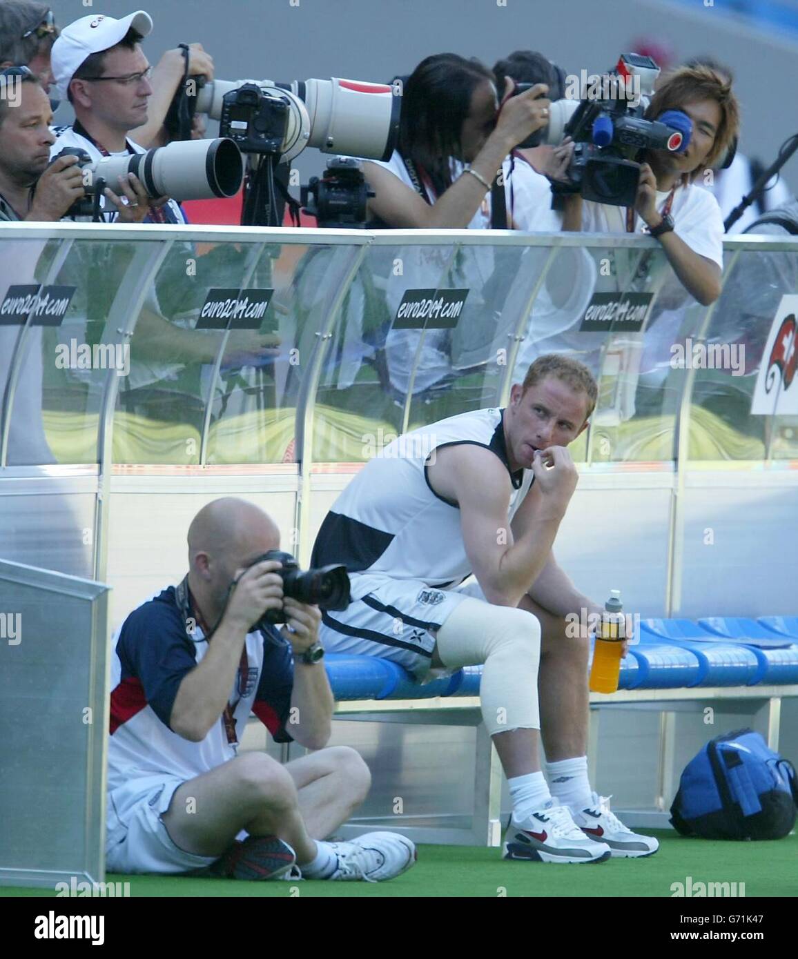 England's Nicky Butt sits out a training session on the Cidade de ...