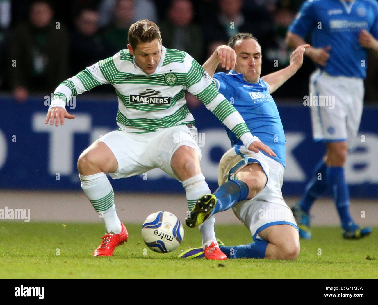 St Johnstone's Lee Croft (right)challenges Celtic's Kris Commons during ...