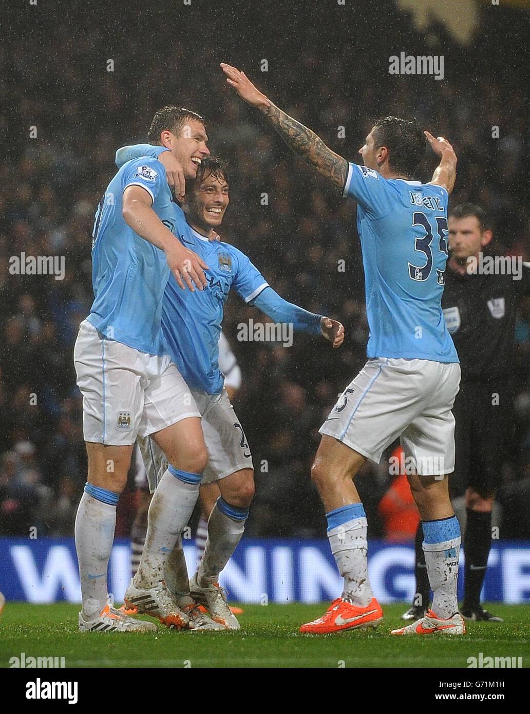 Manchester City's Edin Dzeko (left) celebrates scoring his teams second ...