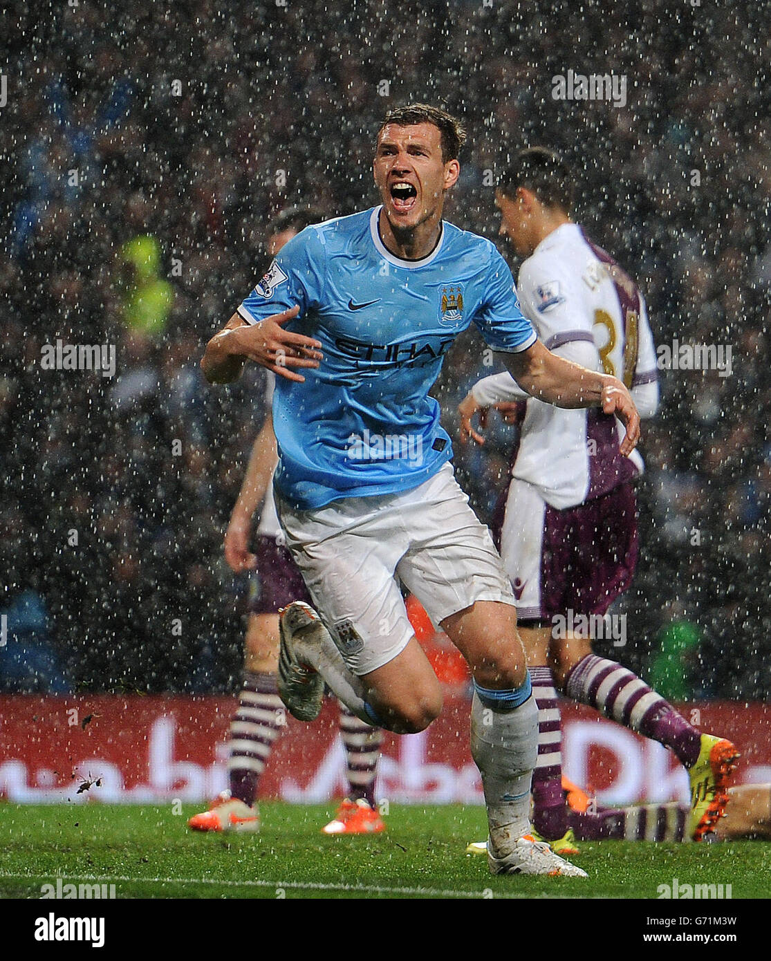Manchester City's Edin Dzeko celebrates scoring his teams 1st goal ...