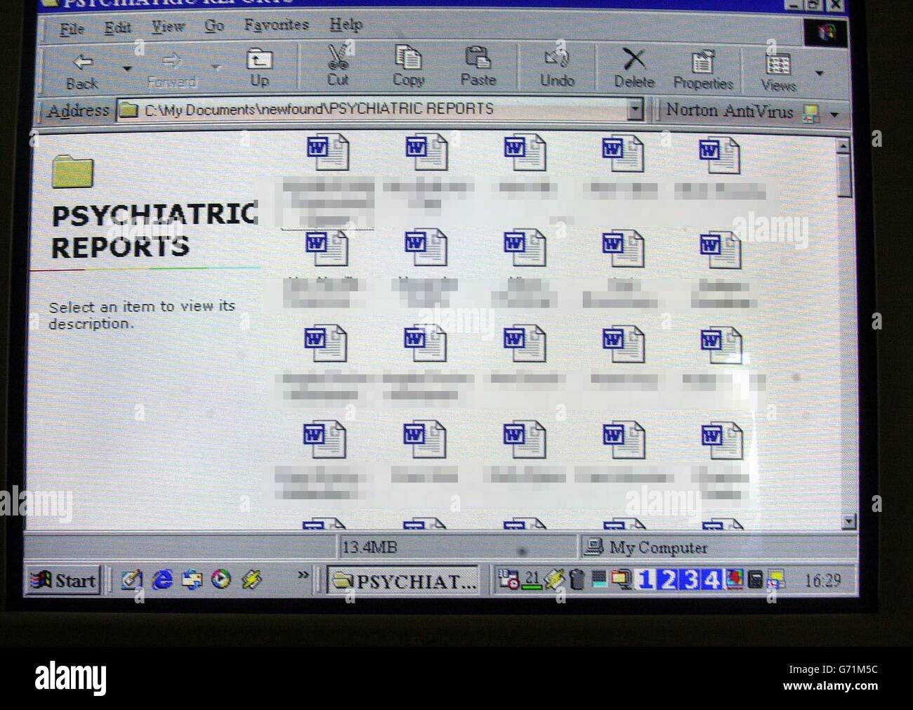 NHS reports on 4 computer Stock Photo - Alamy