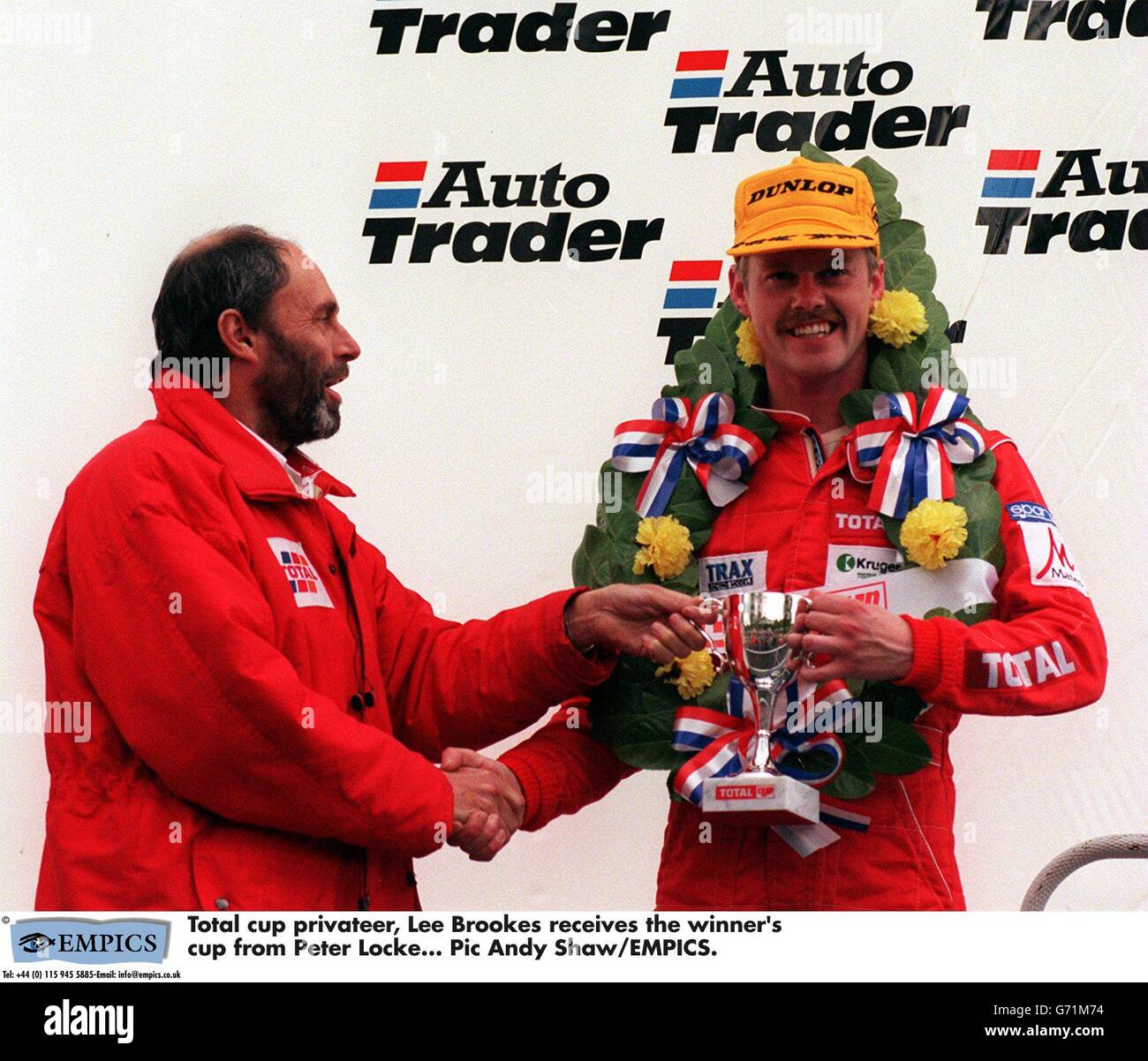 Total cup privateer, Lee Brookes receives the winner's cup from Peter ...