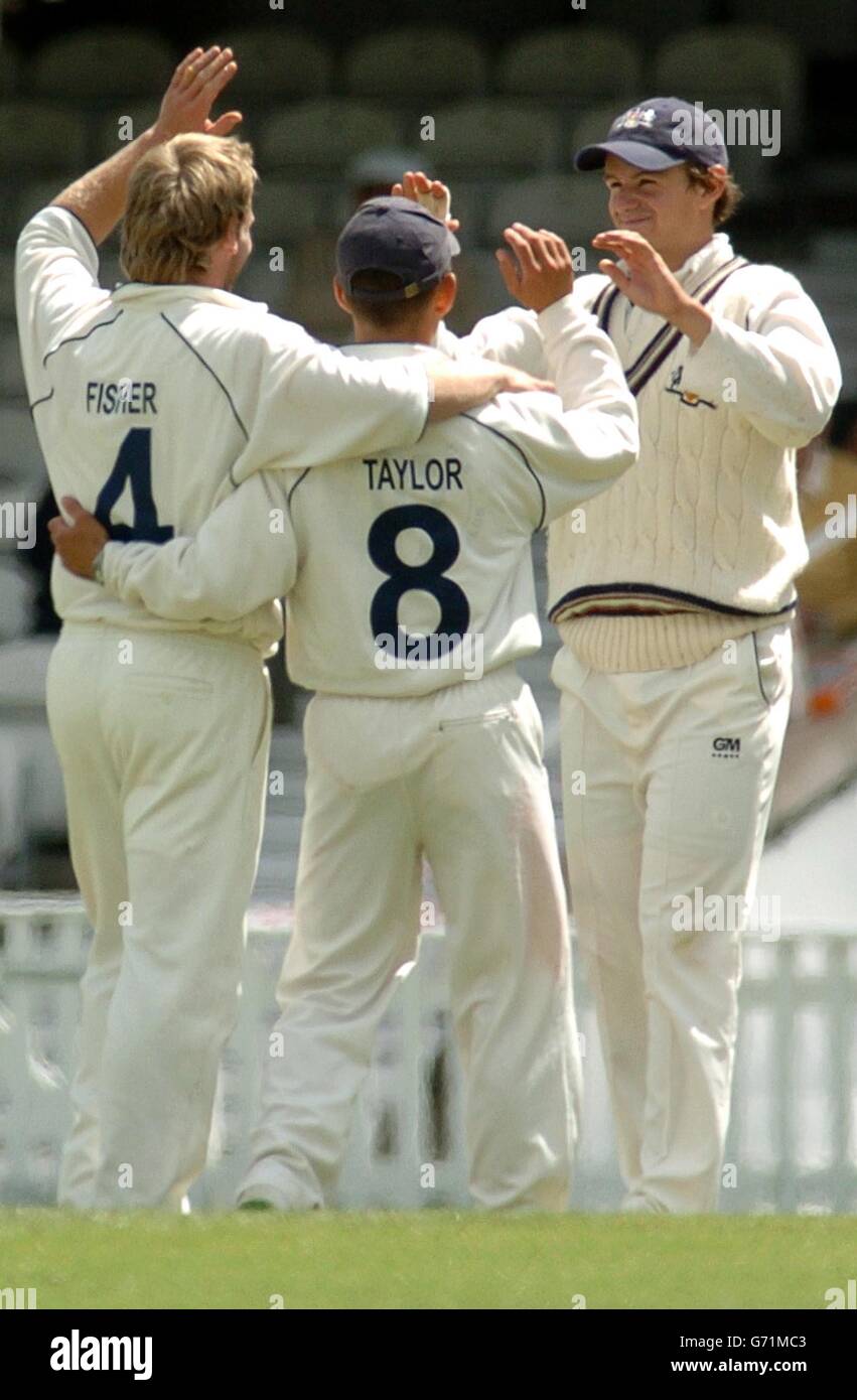 Gloucestershire's Alex Gidman (right) celebrates after taking the catch ...