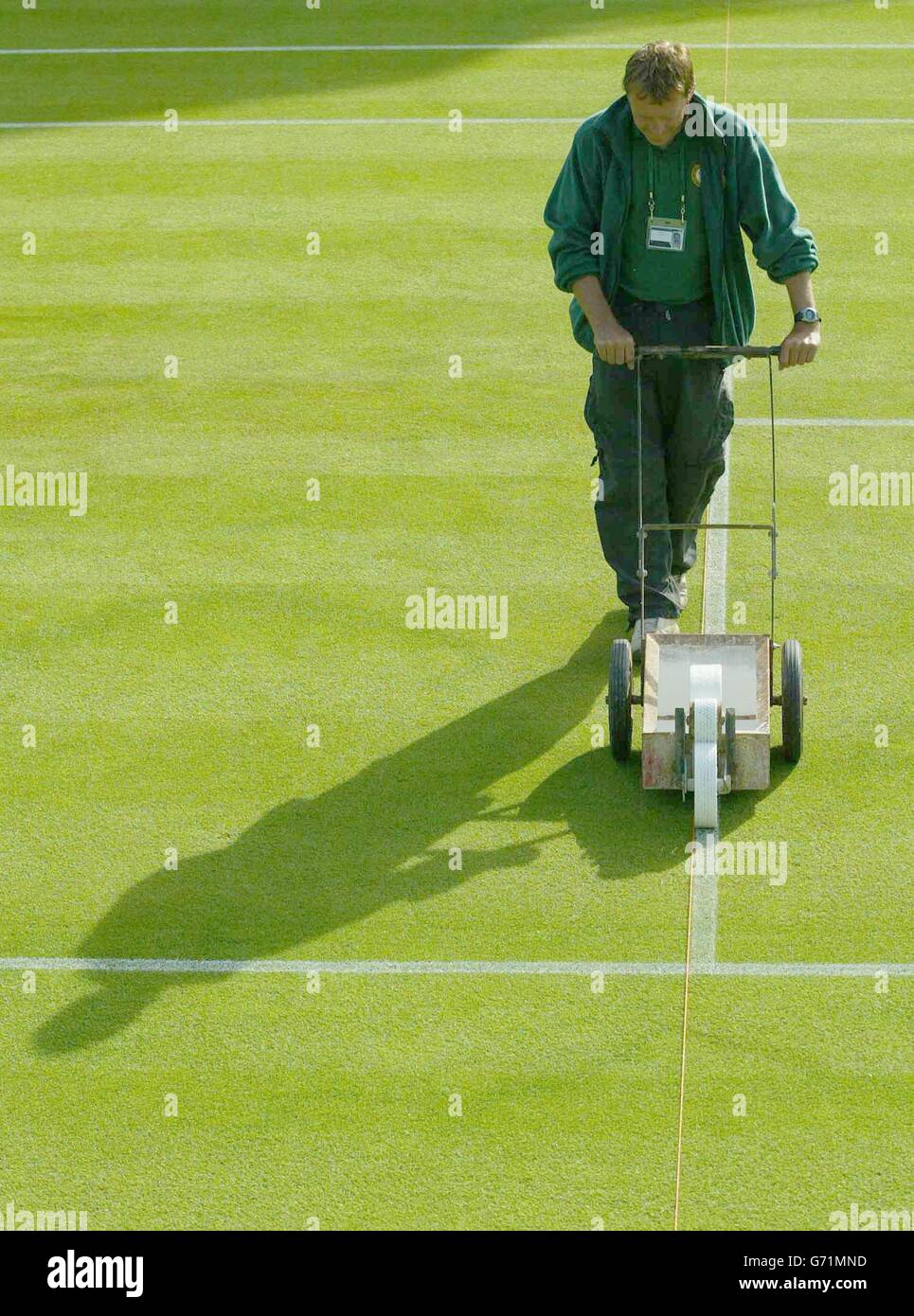 A line painter on court 19 Stock Photo - Alamy