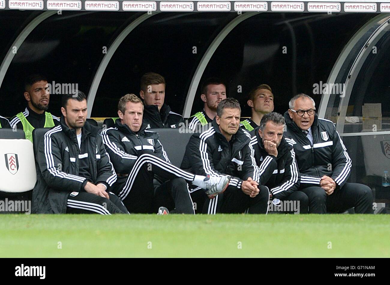 Fulham manager Felix Magath (right) talks to first team coach Tomas ...