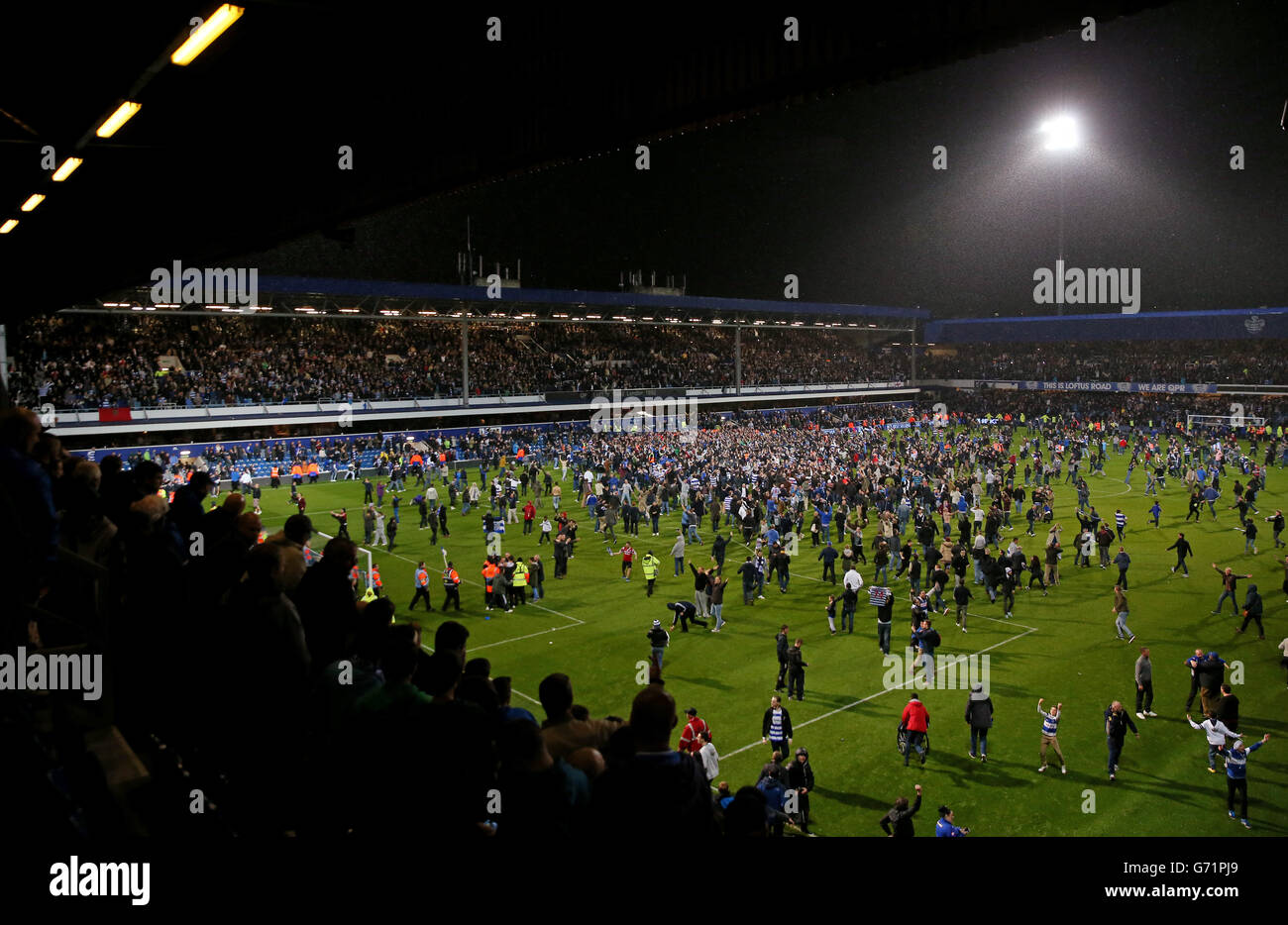 The QPR fans invade the pitch after the final whistle during the Sky ...