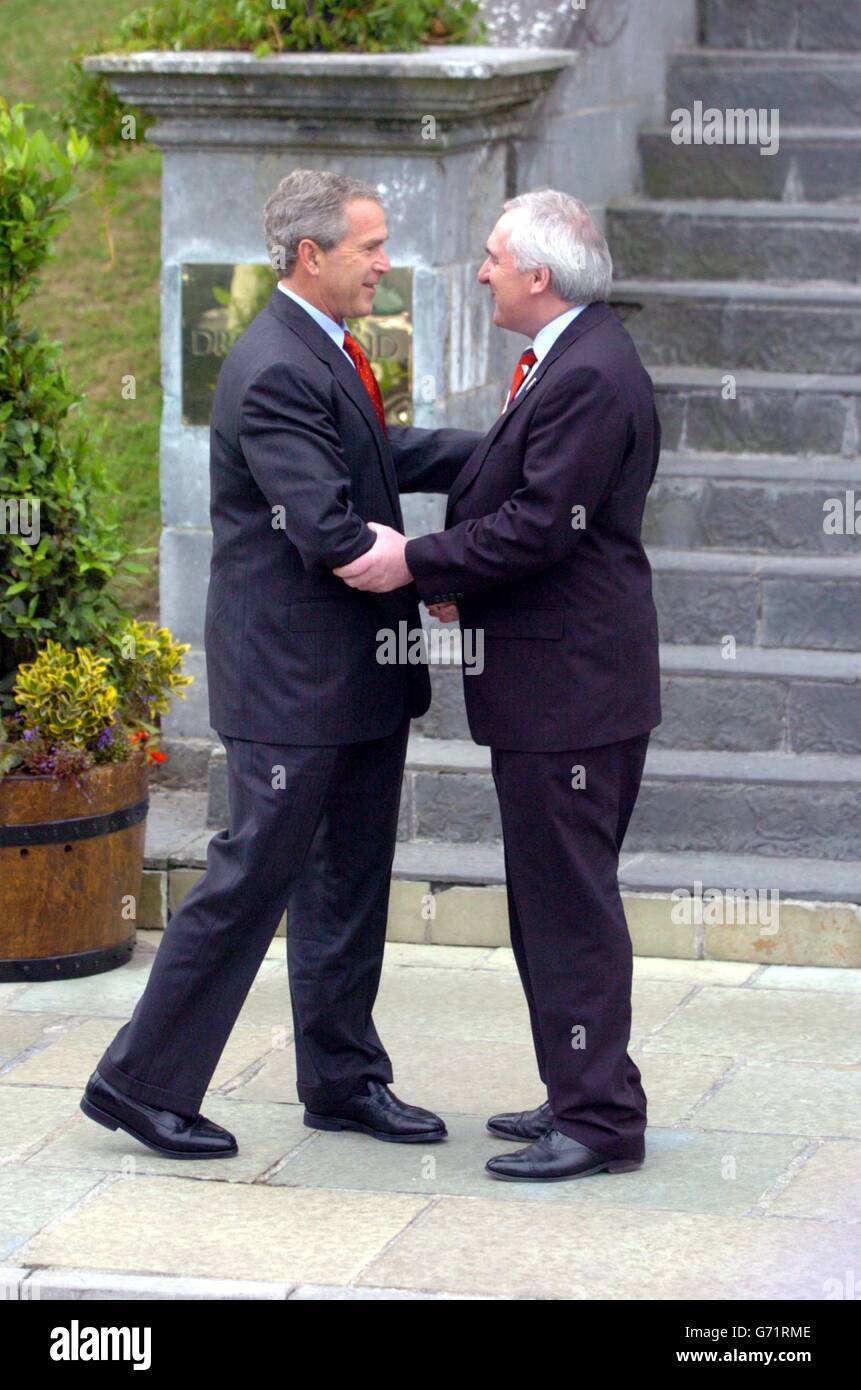 US President George W. Bush is greeted by the Taoiseach, Bertie Ahern ...