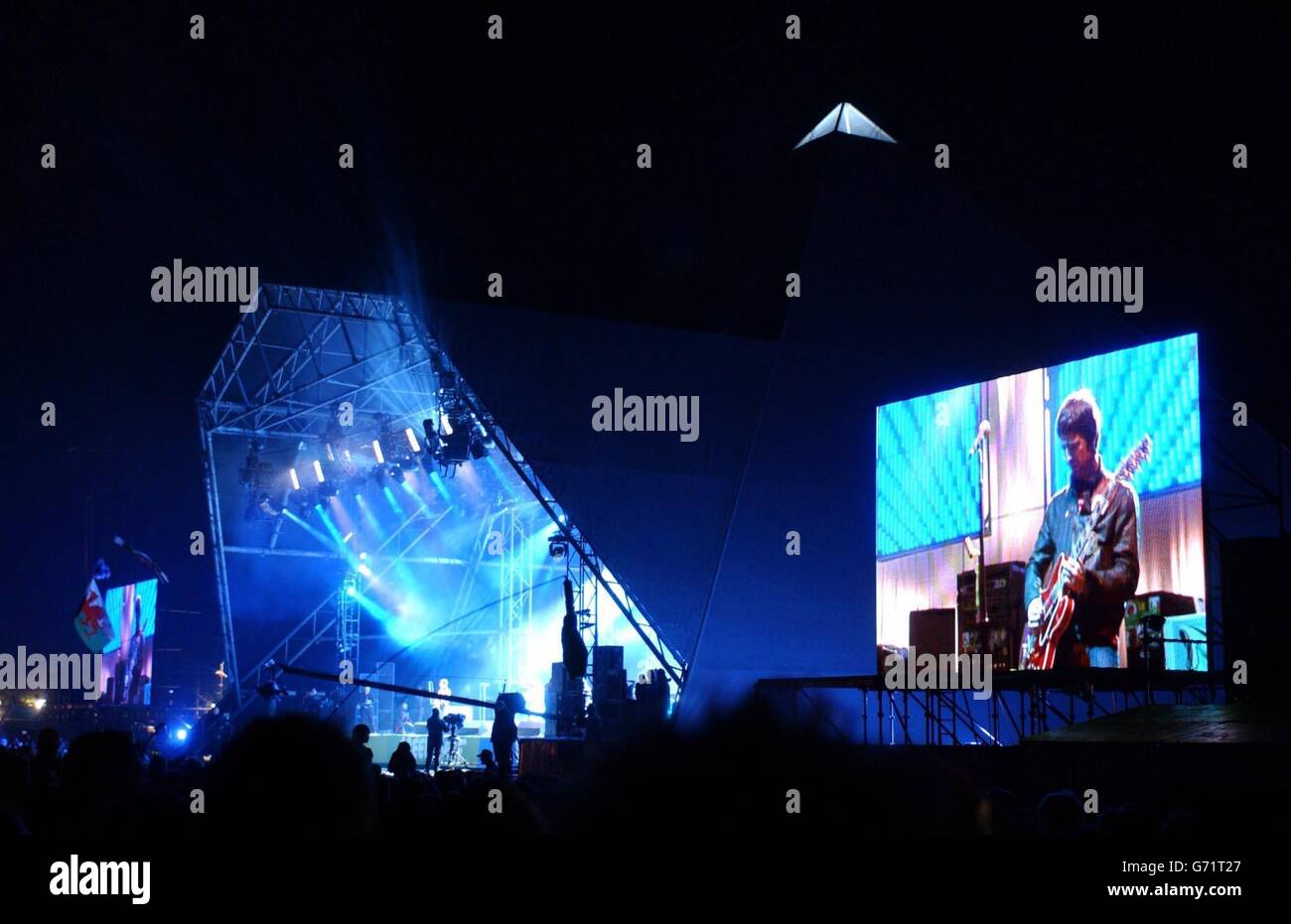 Oasis performs live on stage during the glastonbury festival hi-res ...