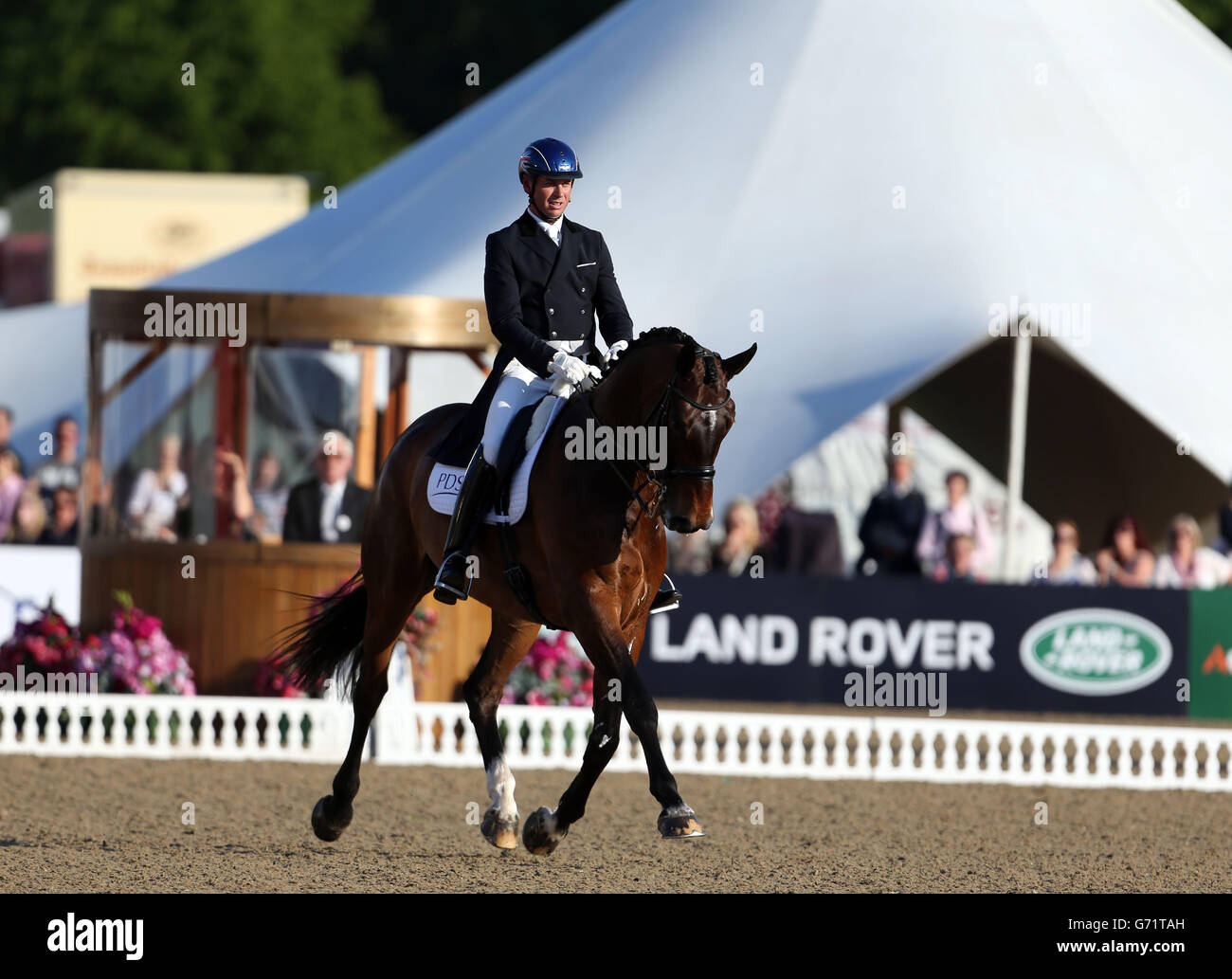 Great Britain's Carl Hester riding Nip Tuck competes in the Grand Prix ...