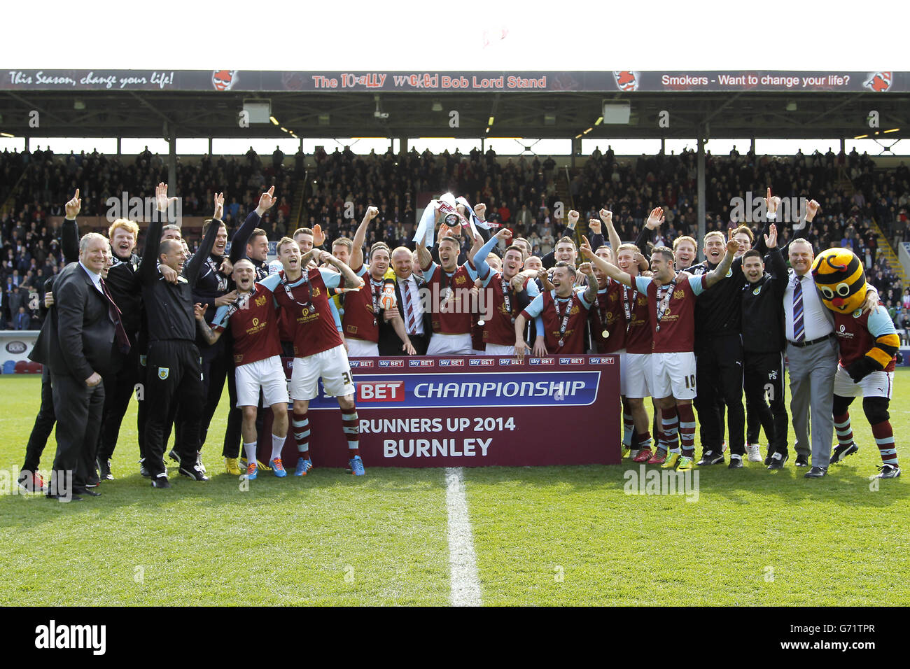 Burnley's players and staff celebrate promotion and finishing 2014 ...