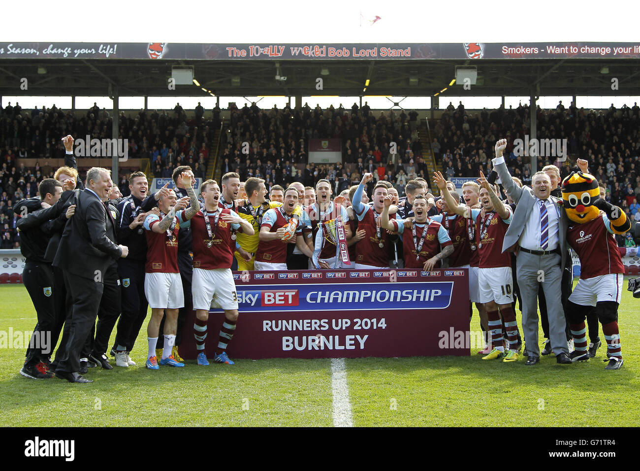 Burnley's players and staff celebrate promotion and finishing 2014 ...
