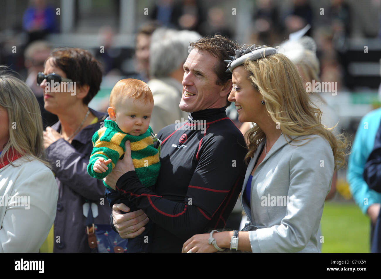 AP McCoy holds his son Archie with his wife Chanelle and Daughter Eve ...