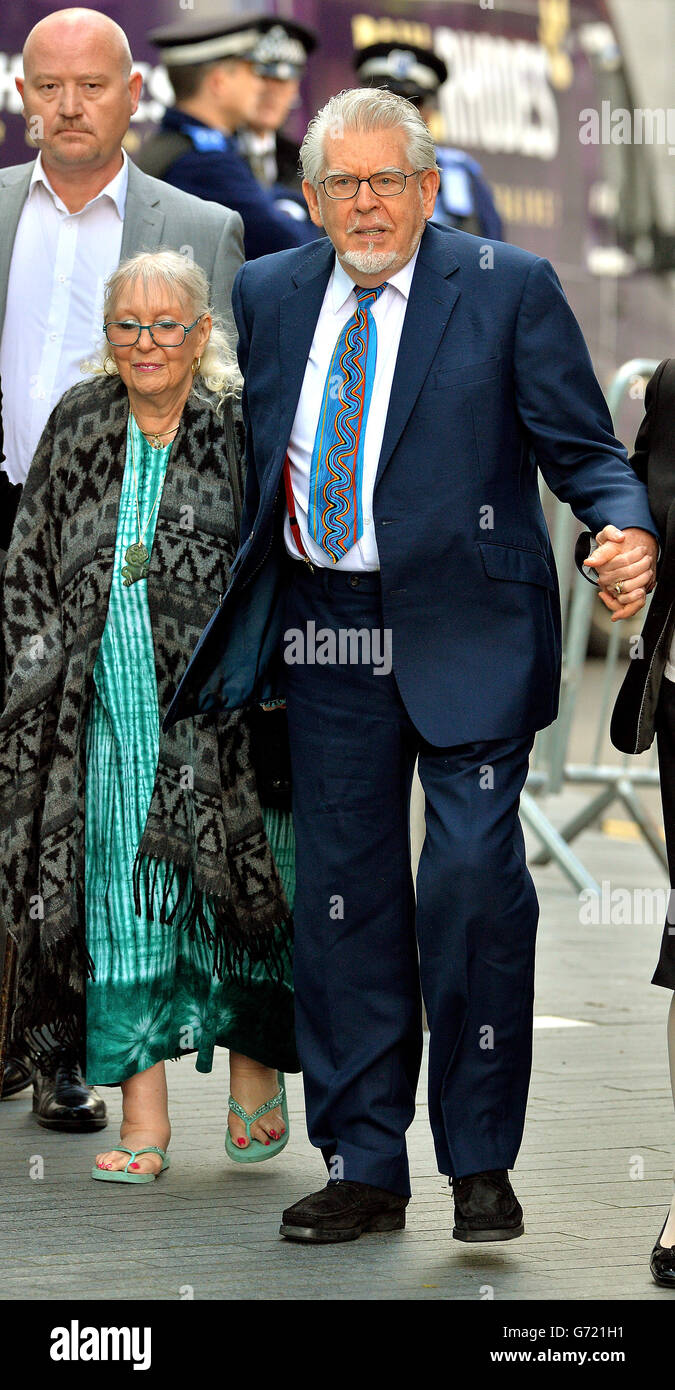 Rolf Harris (right), 84, with his wife Alwen, arrive at Southwark Crown ...