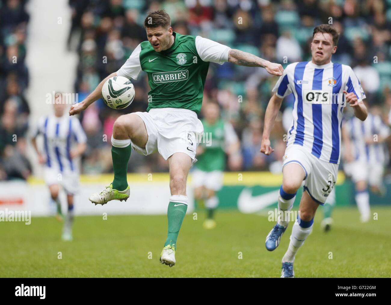 Hibernian's Michael Nelson and Kilmarnock's Robbie Muirhead battle for ...