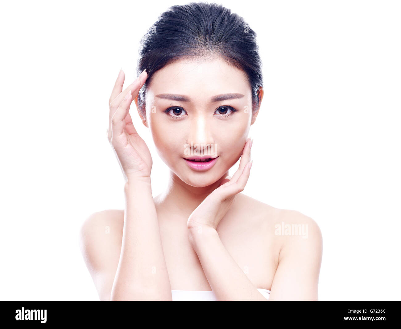 studio portrait of a young asian woman, isolated on white Stock Photo ...