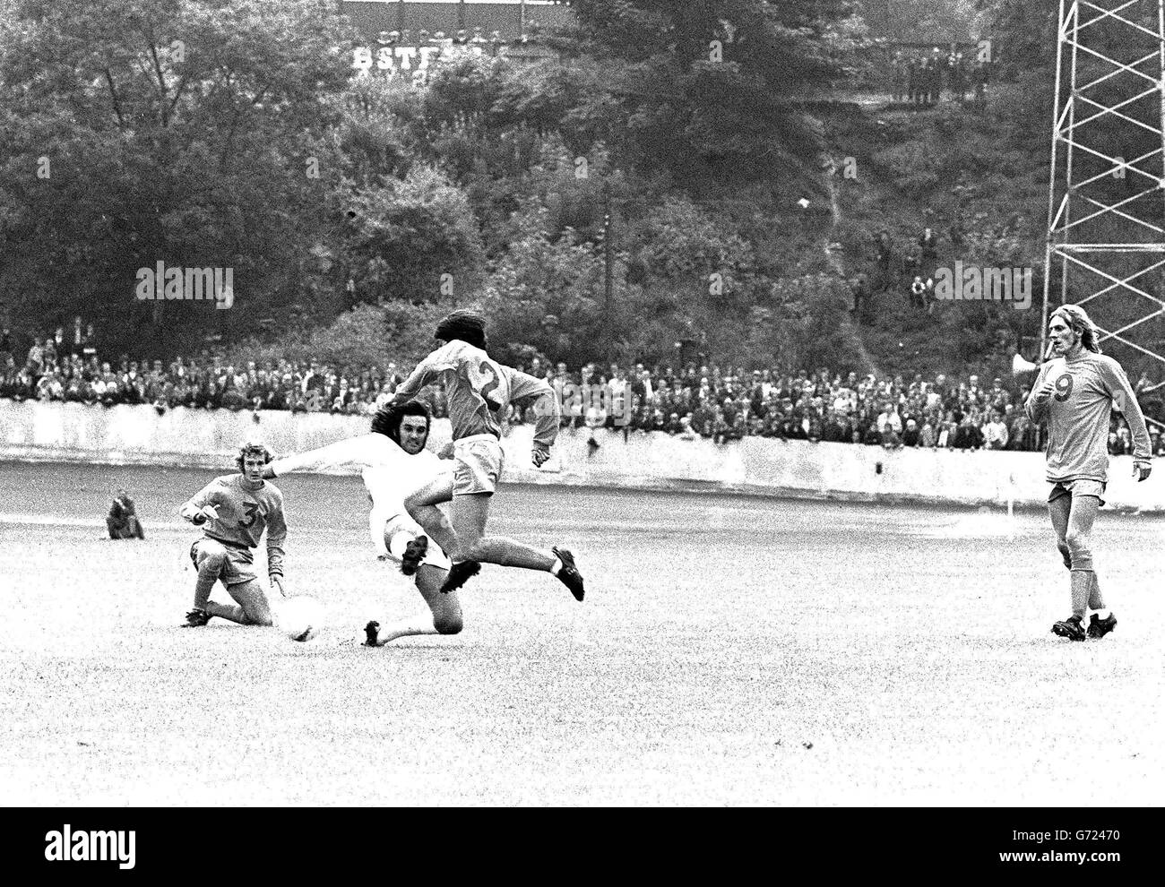 Manchester United star George Best gets the worst of an encounter with ...