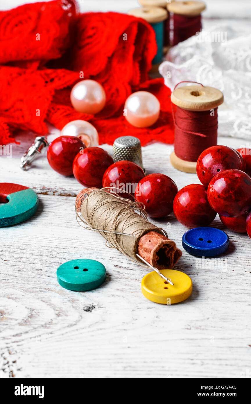 Lace,beads and thread working tools for craft and skill Stock Photo - Alamy