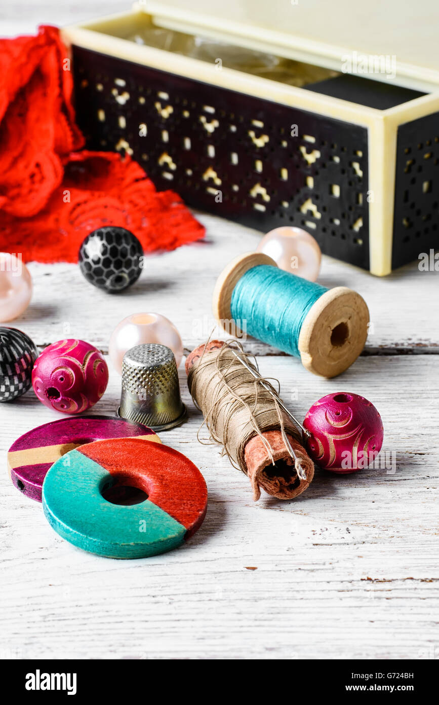 Lace,beads and thread working tools for craft and skill Stock Photo - Alamy