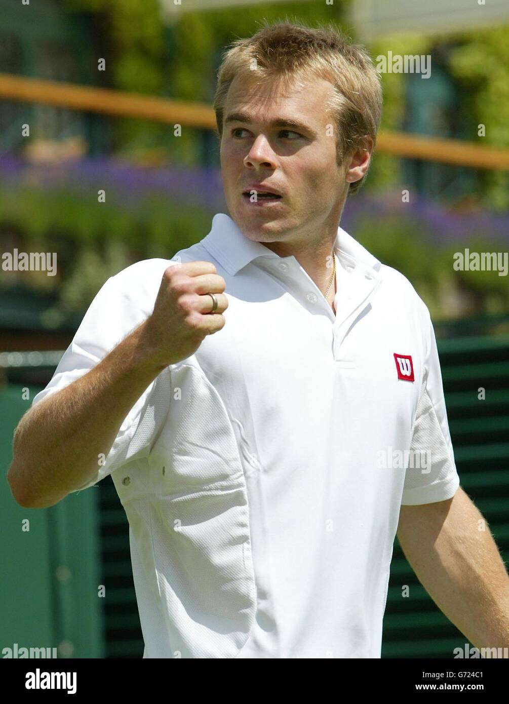 Great Britain's Mark Hilton punches the air after defeating Albert ...