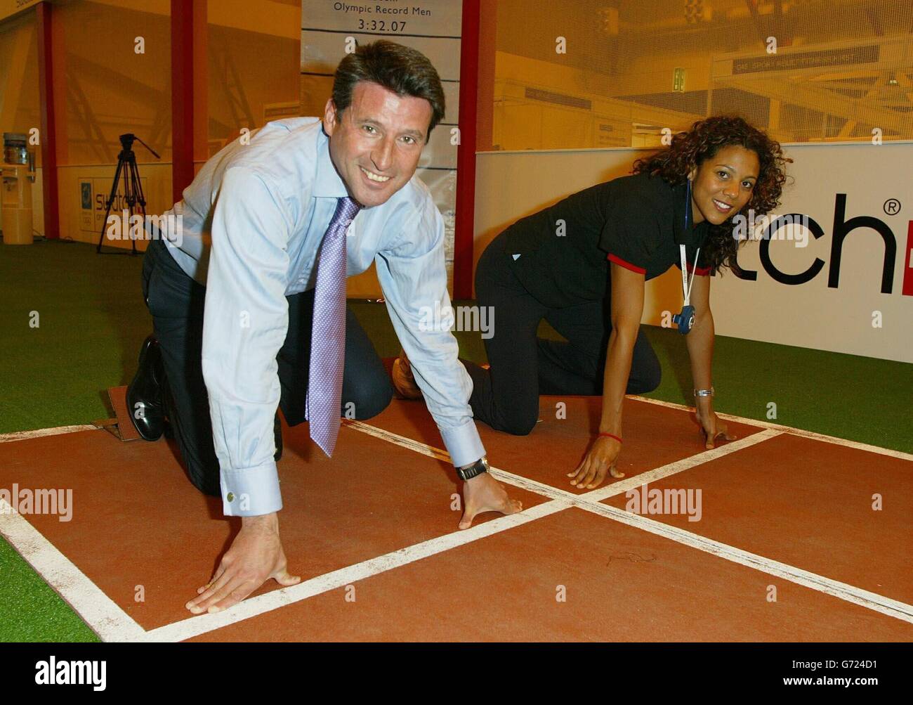 Lord Coe (left) and 800m runner Jo Fenn at the Swatch Experience Zone ...