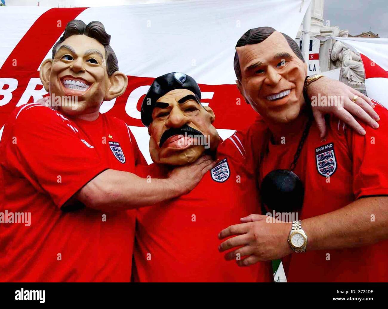 Three England fans from Birmingham wearing masks of (from left-right ...