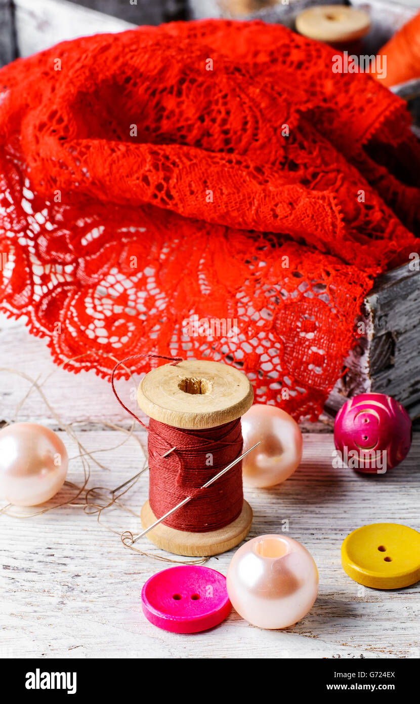 Lace,beads and thread working tools for craft and skill Stock Photo - Alamy