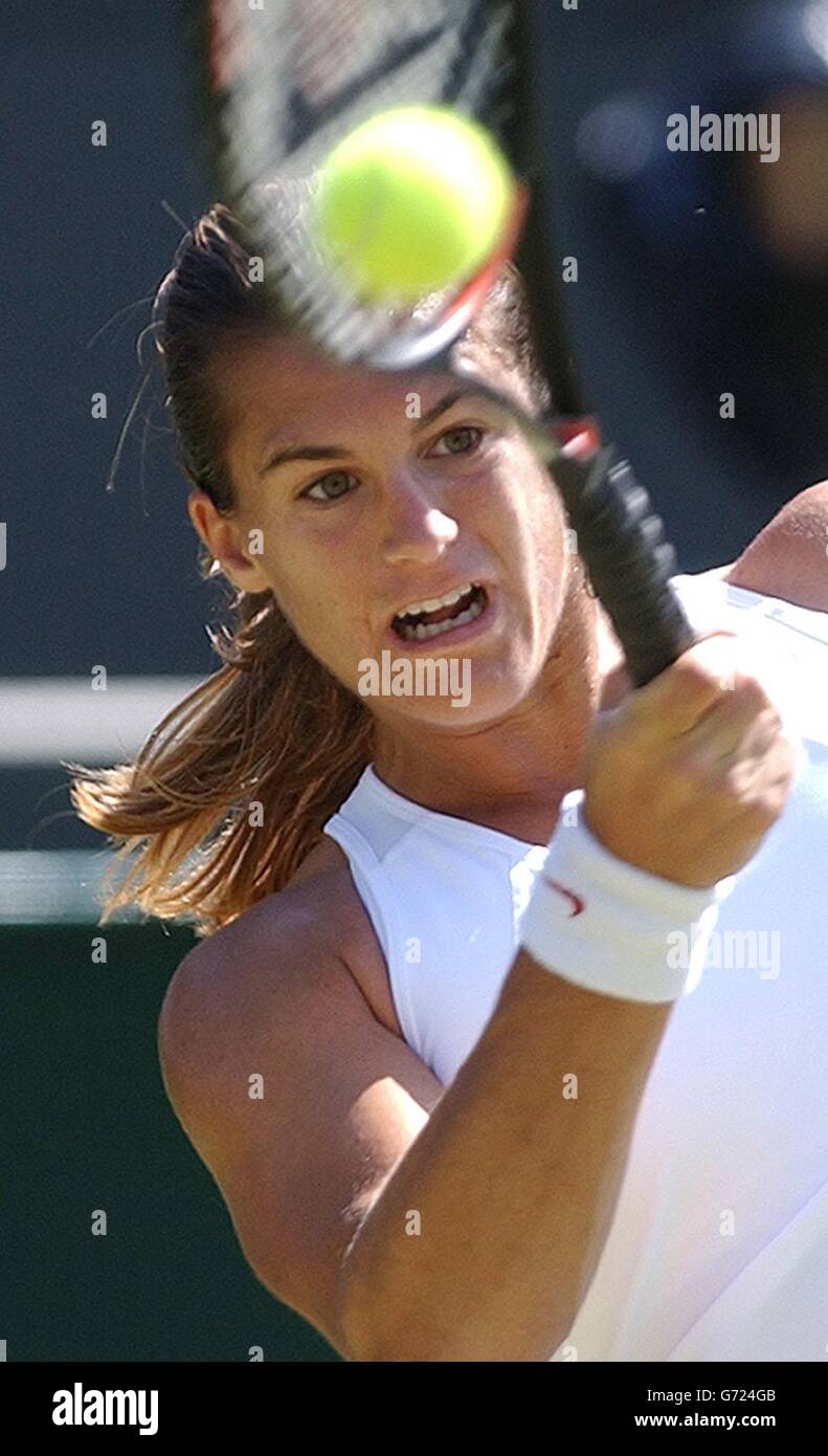 Amelie Mauresmo from France in action against Ludmila Cervanova from ...