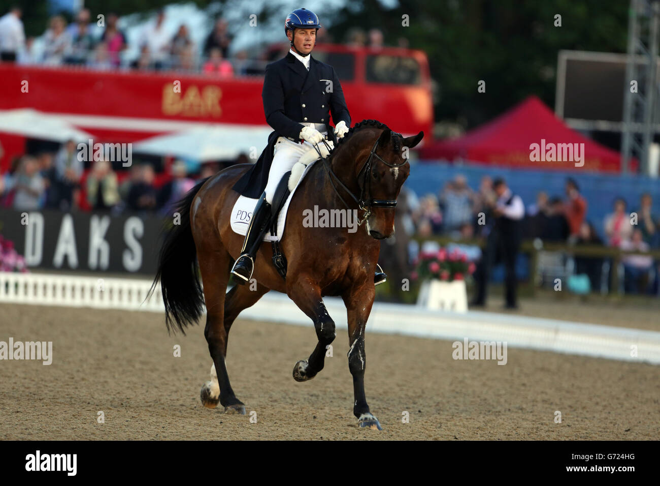 Great Britain's Carl Hester riding Nip Tuck competes in the FEI Grand ...