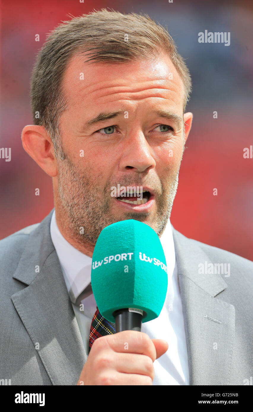 Former Hull City player and ITV pundit Ian Ashbee pitchside prior to ...