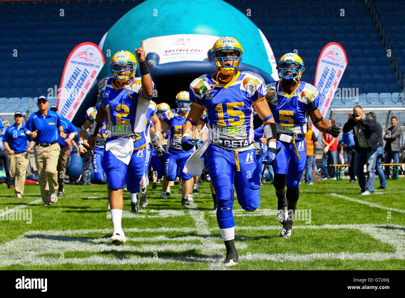 American Football, the Vienna Vikings entering the stadium in Liebenau ...