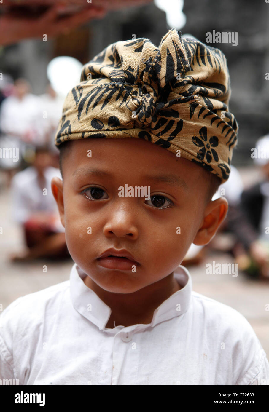 Little boy wearing a festive dress, portrait, religious ceremony in a ...