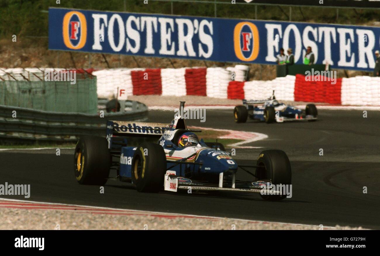 Motor Racing ... Portuguese Grand Prix. Jacques Villeneuve leads rival ...
