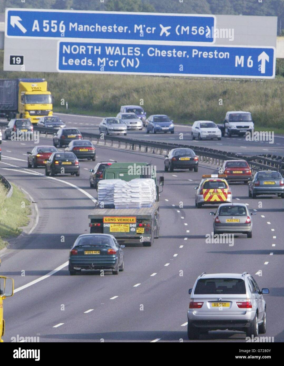 Vehicles pass along the M6 motorway outside Manchester. Transport ...