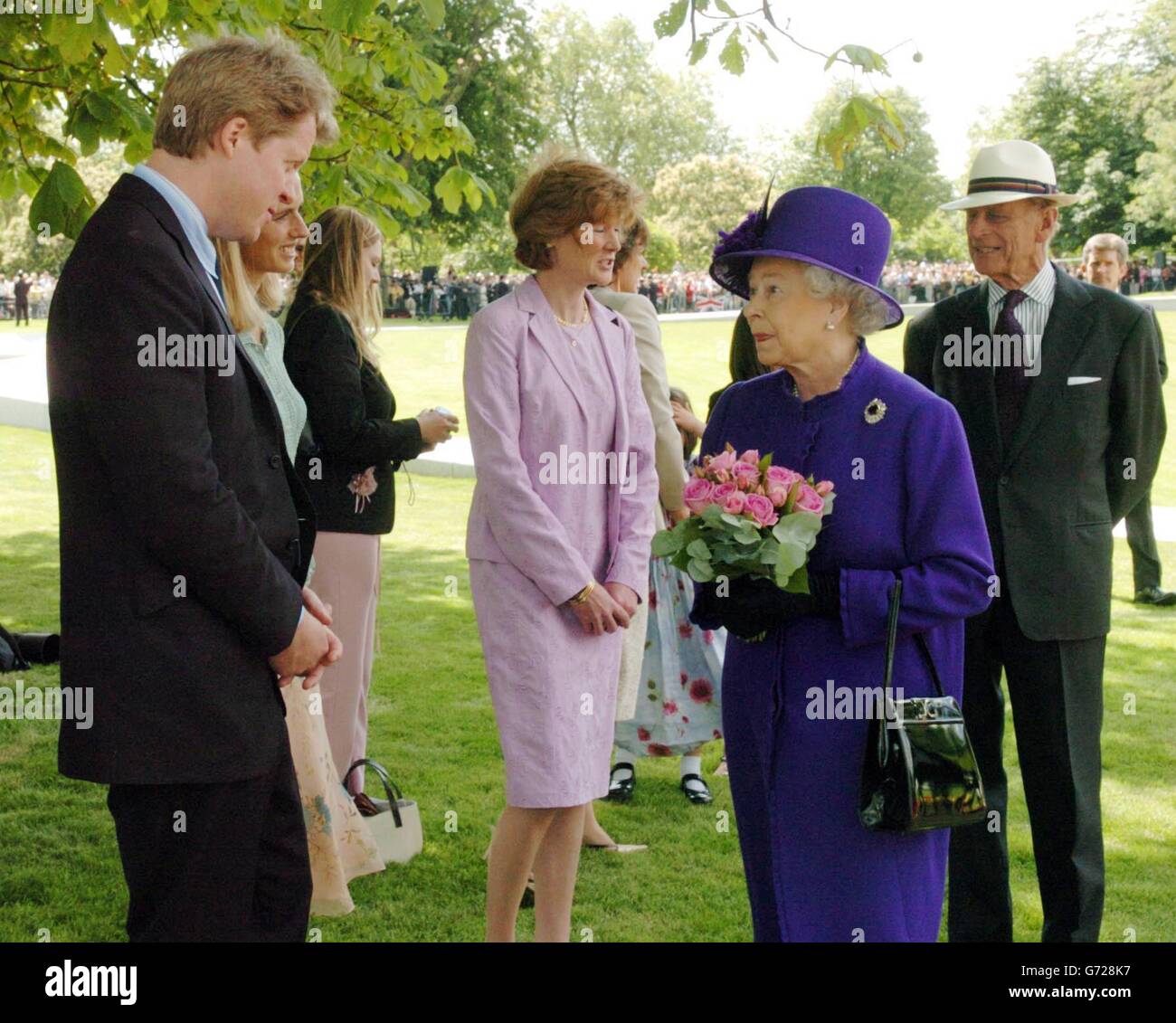 Britain's Queen Elizabeth II talks to Earl Spencer, the brother of the ...