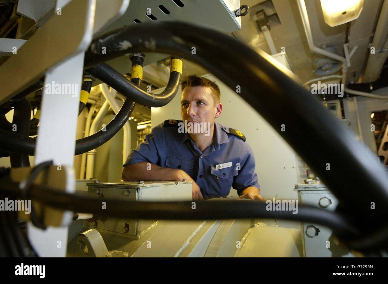 Mickey Holt, weapons engineer in the Conversion Machine Room of HMS ...