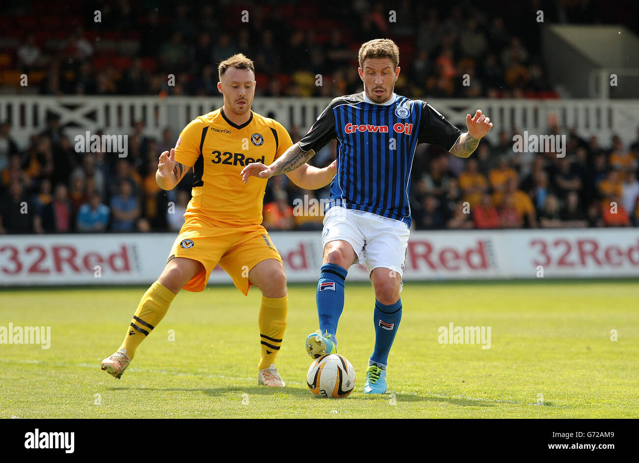 Rochdale's George Donnelly (right) and Newport County's Darcy Blake ...