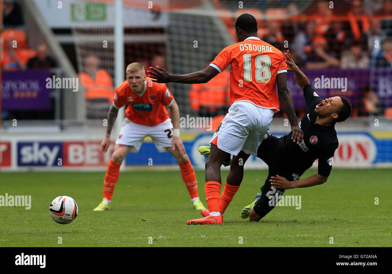 Charlton Athletic's Jordan Cousins and Blackpool's Isaiah Osbourne ...