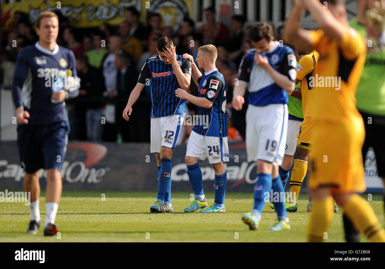 Rochdale's Matthew Lund is consoled by team mate Jamie Allen after the ...