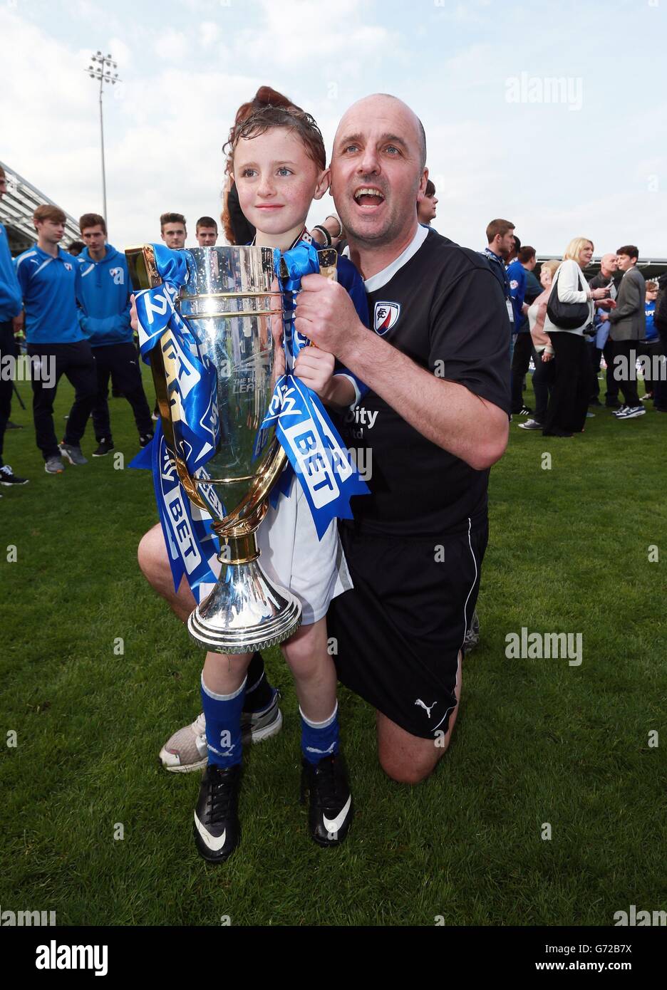 Chesterfield manager Paul Cook celebrates with his son Conor after ...