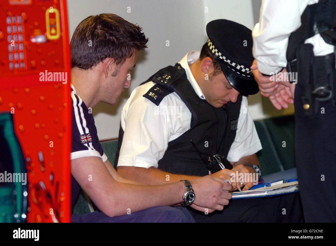 John Parkes (left) arrives at Heathrow Airport, after leaving Portugal ...