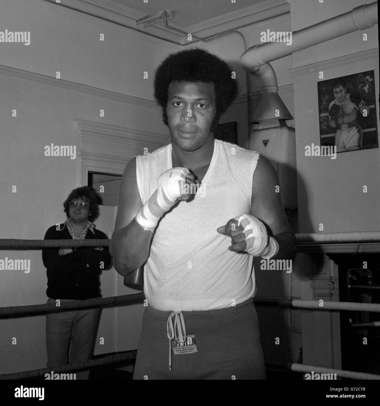 American heavyweight Jimmy Ellis wearing his headguard during a break ...
