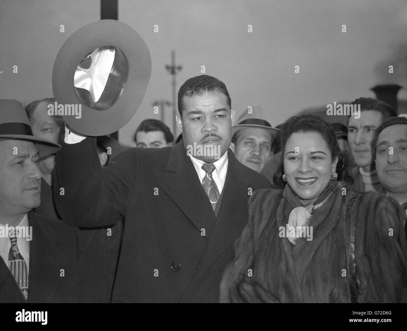 World Heavyweight champion Joe Louis, with his wife Marva, takes off ...