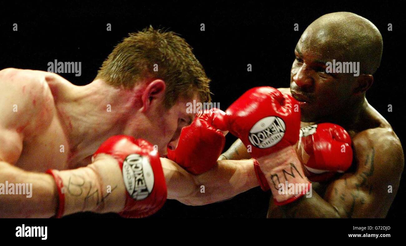 Scotland's Willie Limond (L) in action before beating France's Yousef ...