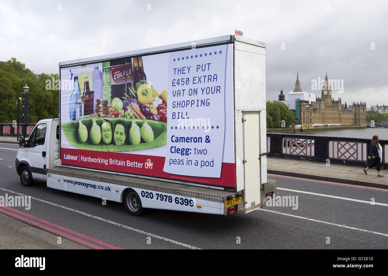 A Labour party campaign poster crosses Lambeth Bridge in front of the ...