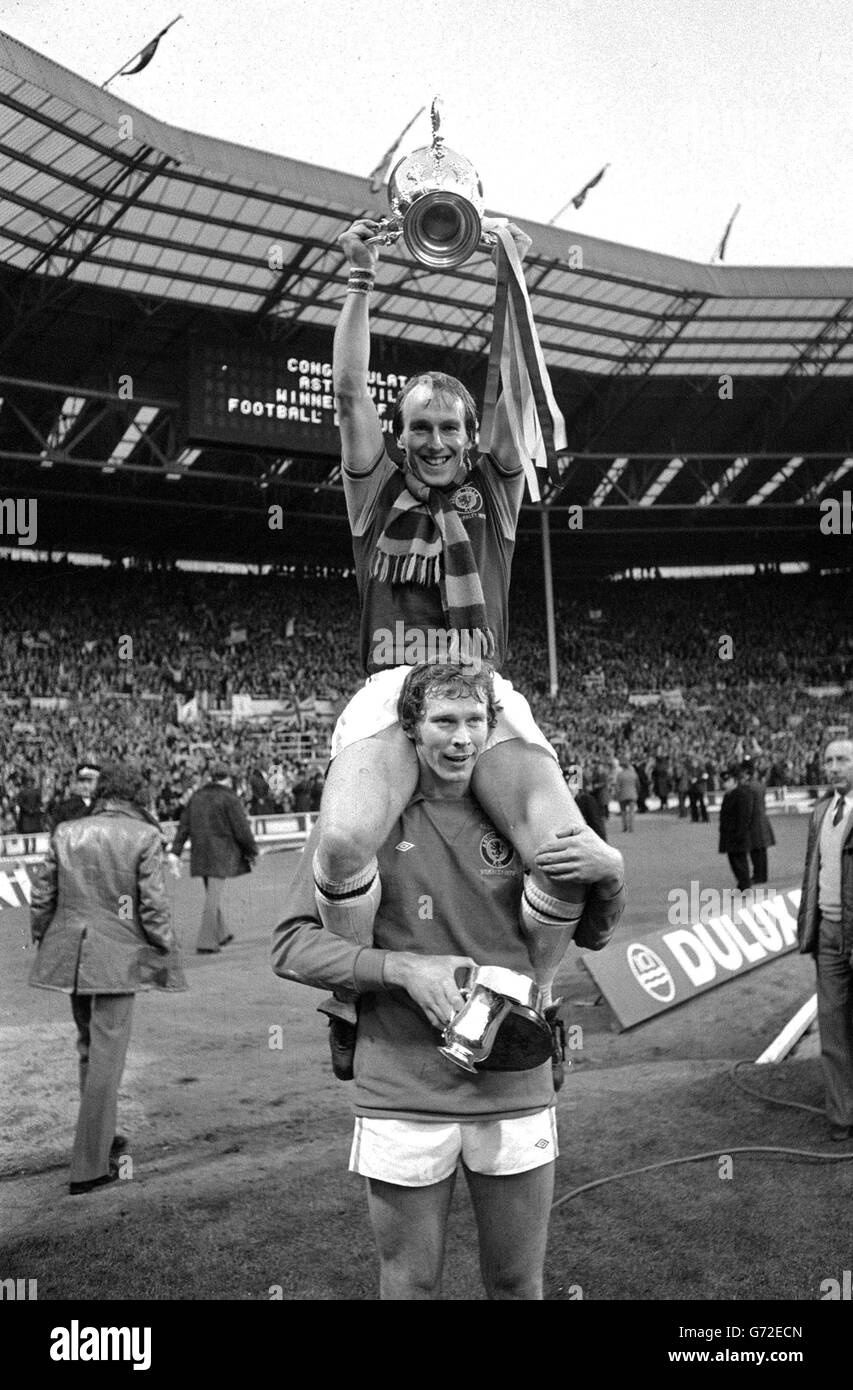 Ray Graydon, who scored the winning goal, holds the League Cup, after ...